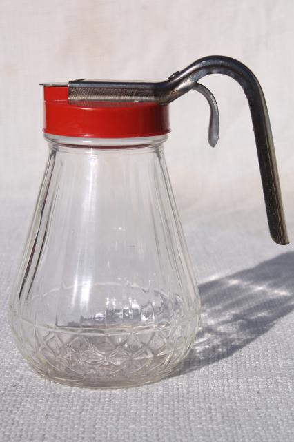 vintage glass syrup pitcher w/ dripcut type metal trigger, red plastic lid